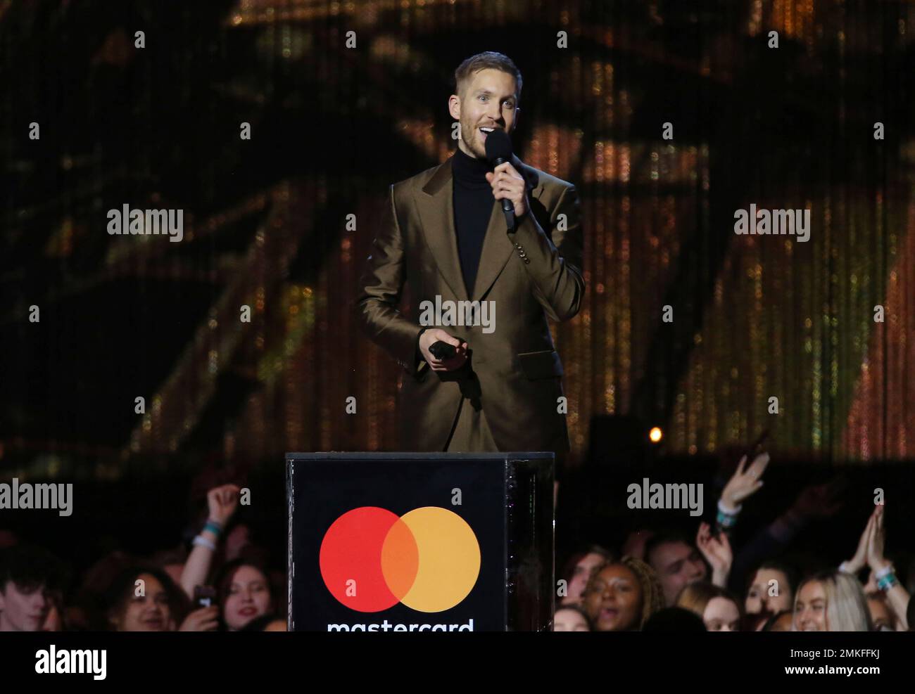 Calvin Harris collects his award for Best British Producer onstage at ...