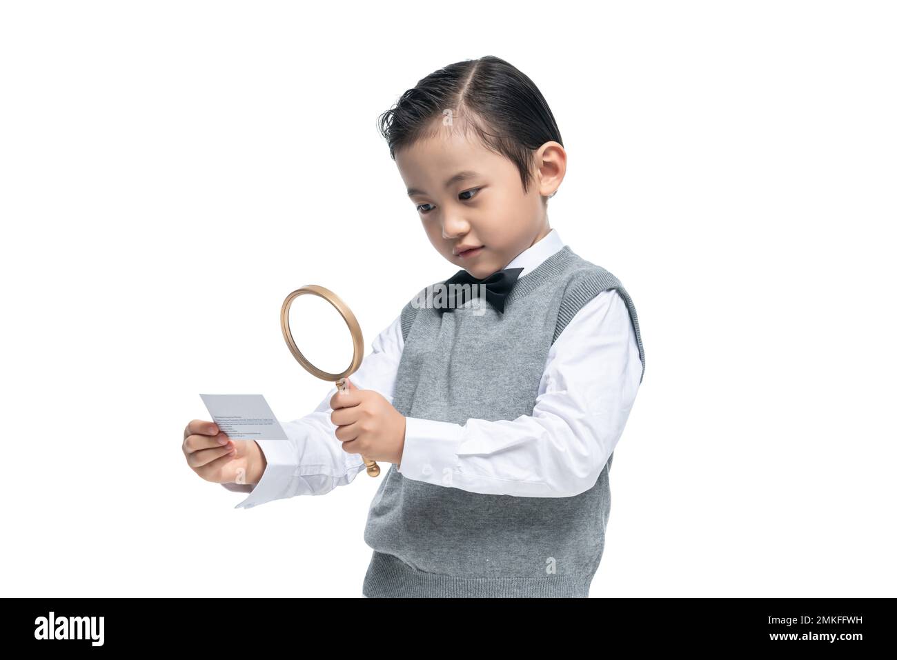 The little boy with a magnifying glass Stock Photo - Alamy