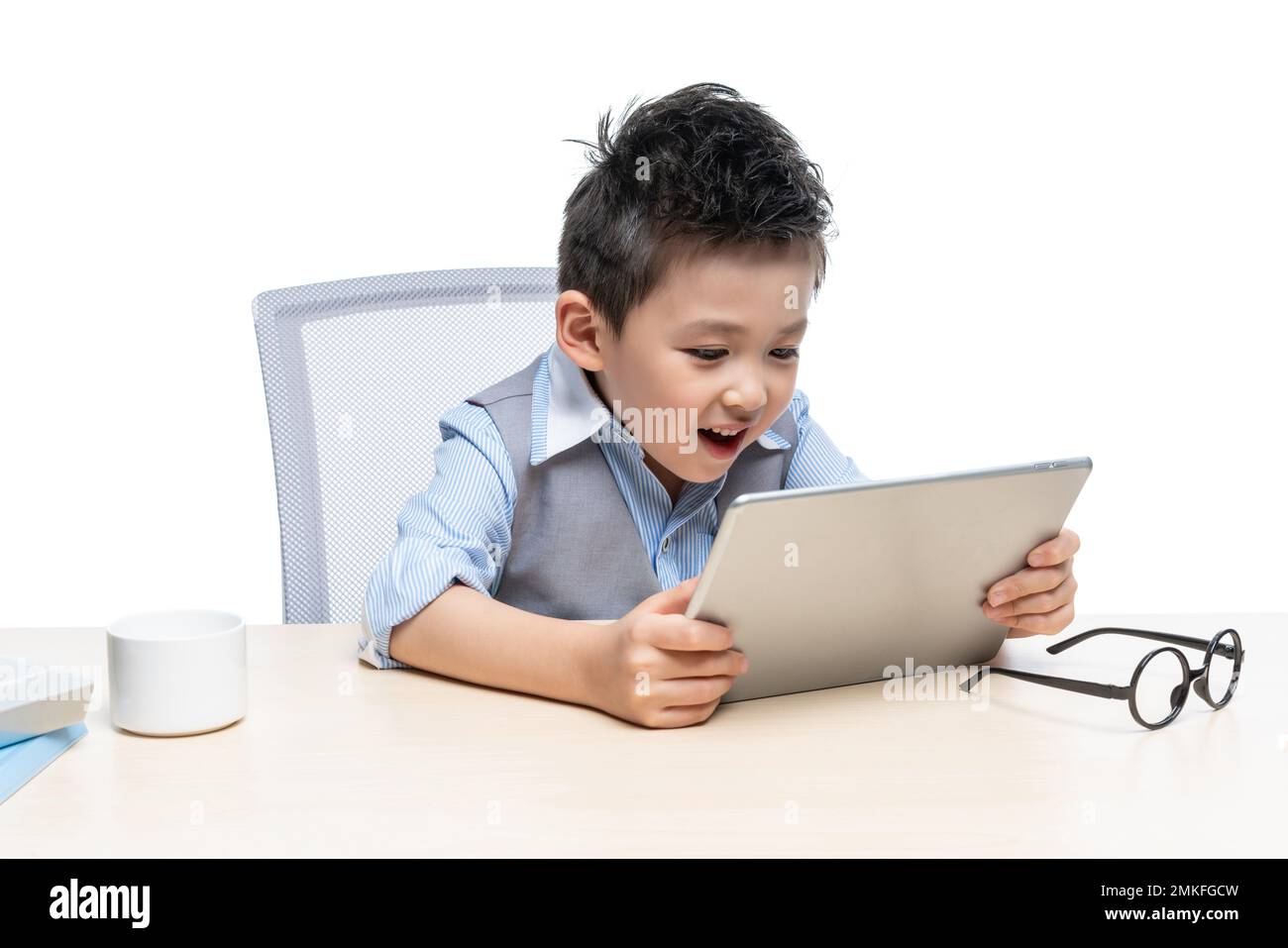 The little boy use tablet computers Stock Photo - Alamy