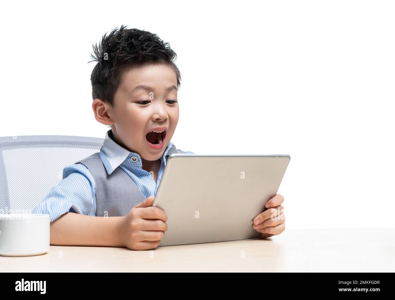 The little boy use tablet computers Stock Photo - Alamy