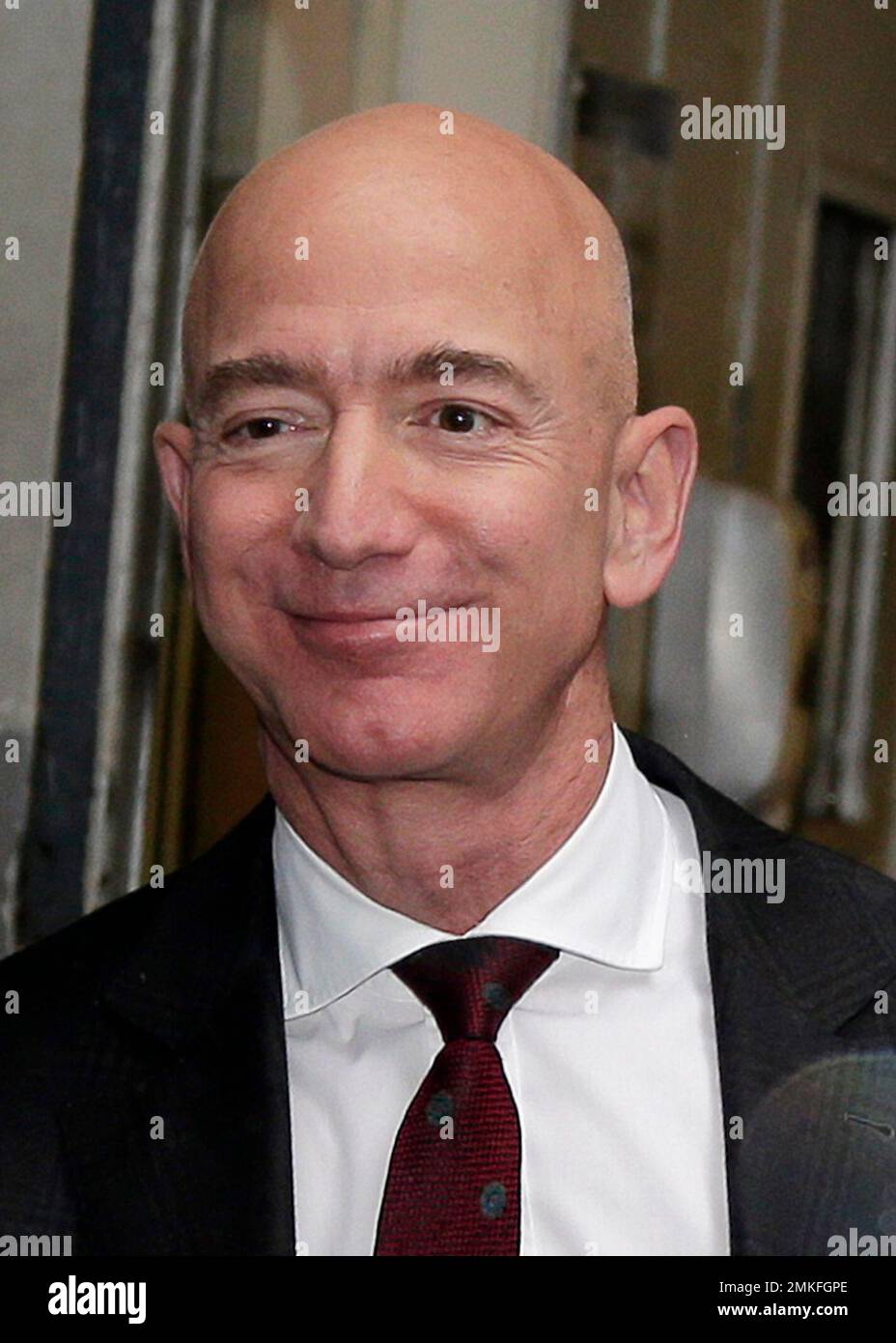 Amazon CEO Jeff Bezos leaves the Yale Club in New York, Wednesday, Feb ...