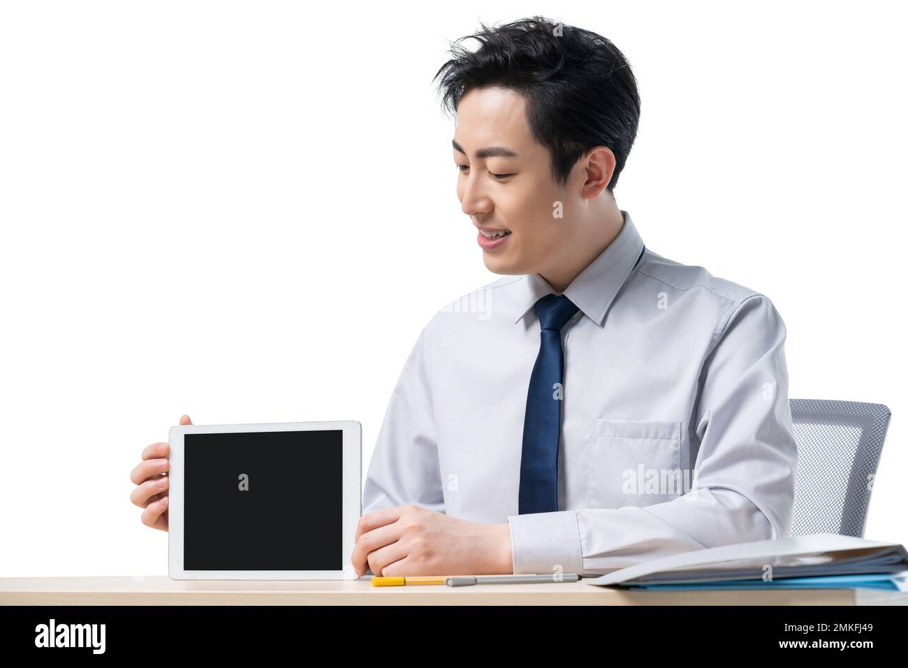 Young business men to use tablet Stock Photo - Alamy