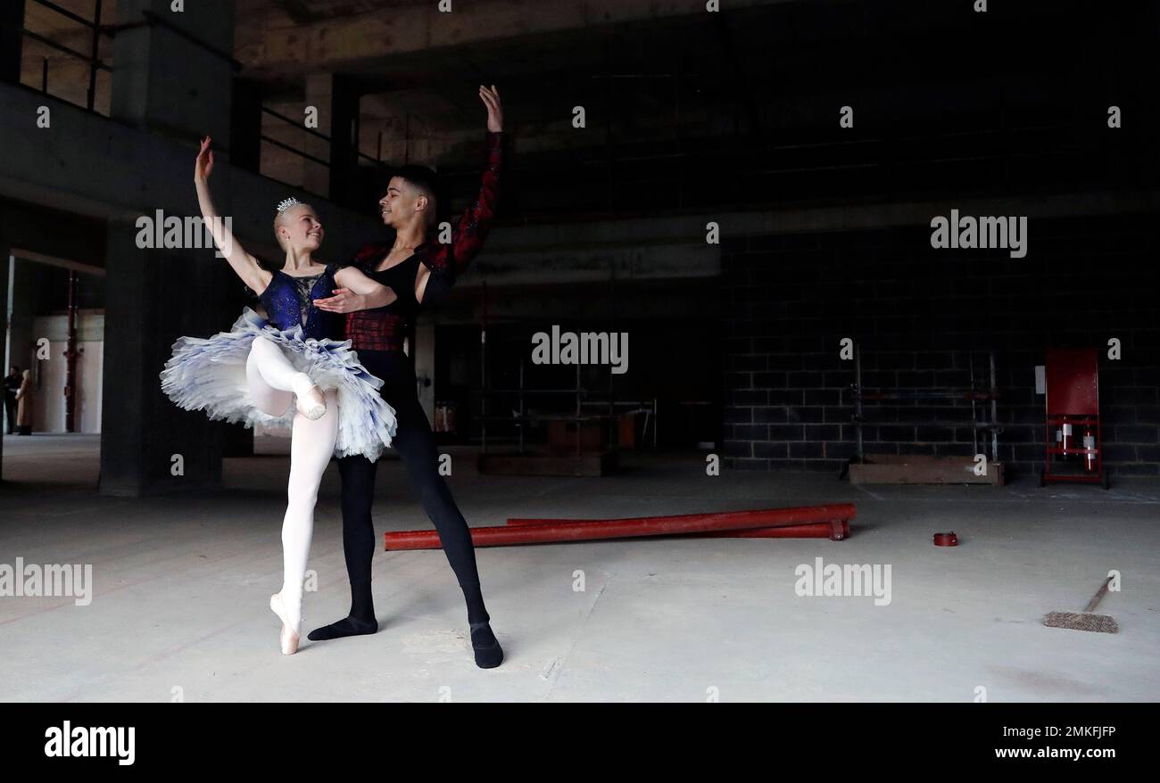 Ballet dancers Brandon Brereton and Emily Pohl pose for photos as ...