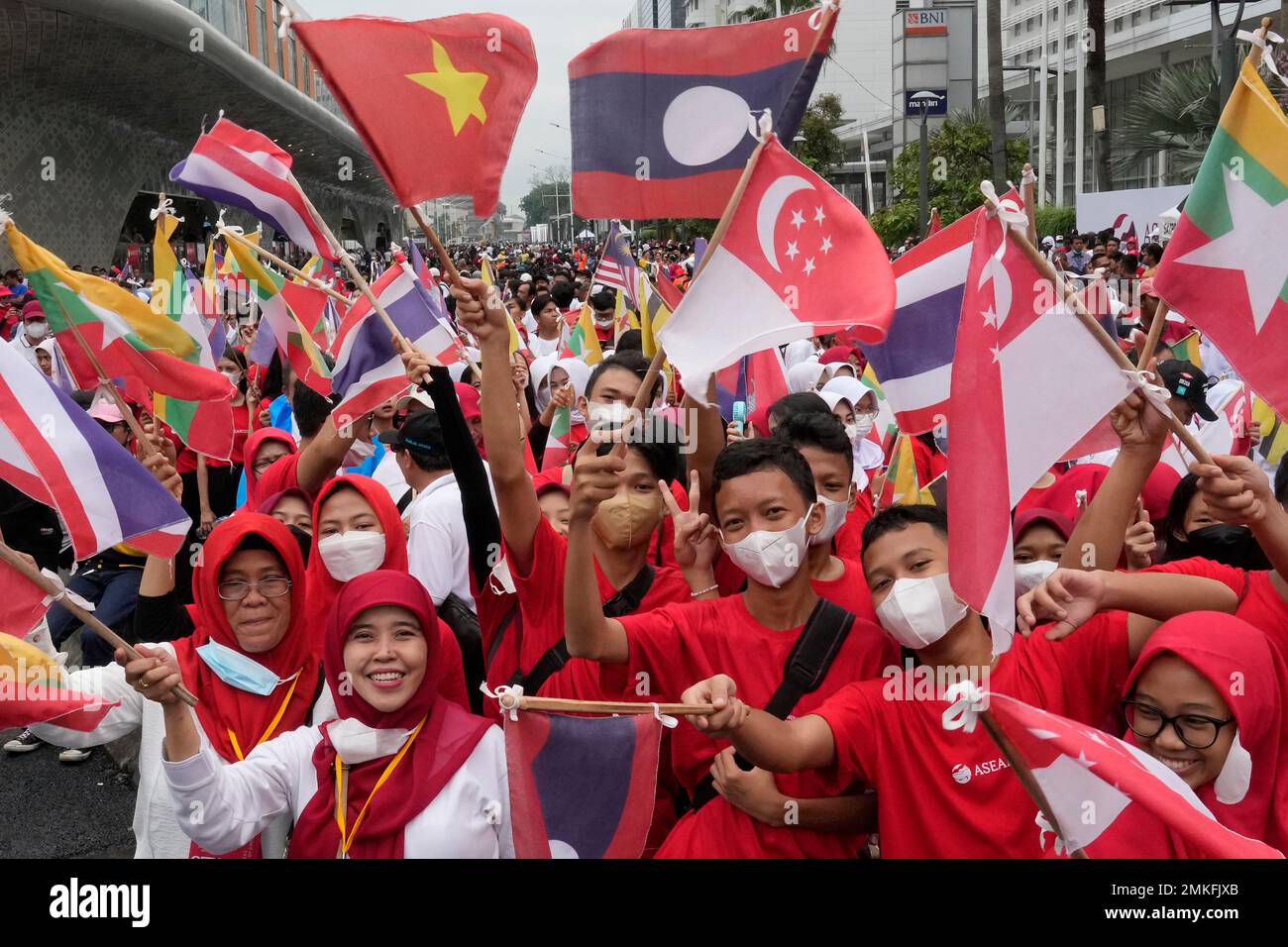 People Gather Waving Asean Member Country Flags During Kick Off 2023
