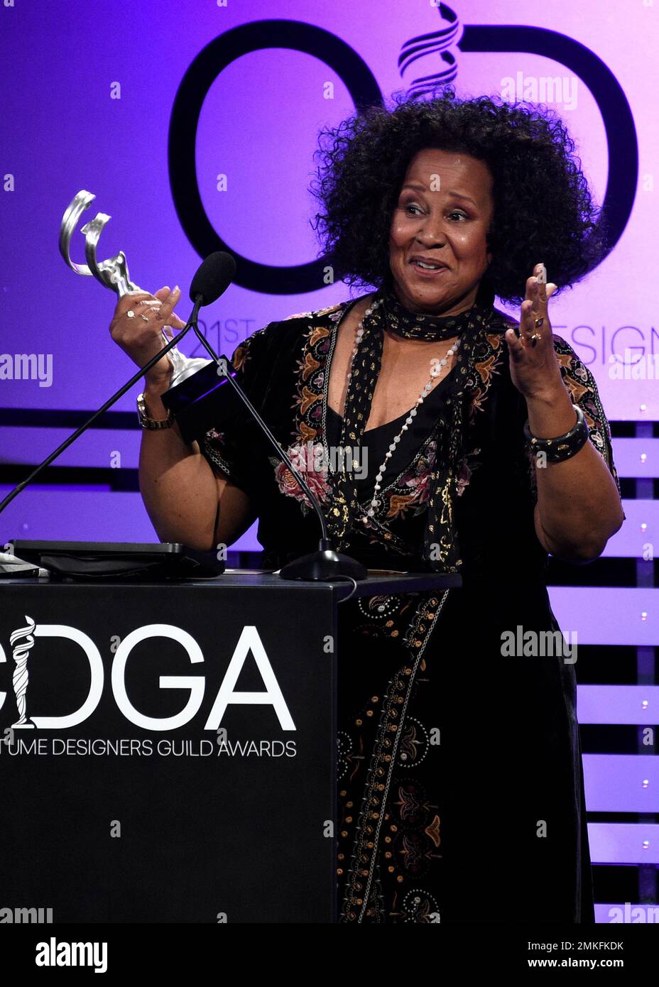 Sharen Davis accepts the award for excellence in sci-fi/fantasy ...