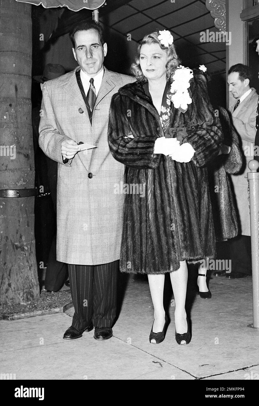 Screen actors Humphrey Bogart and his wife Mayo Methot, who wears a ...