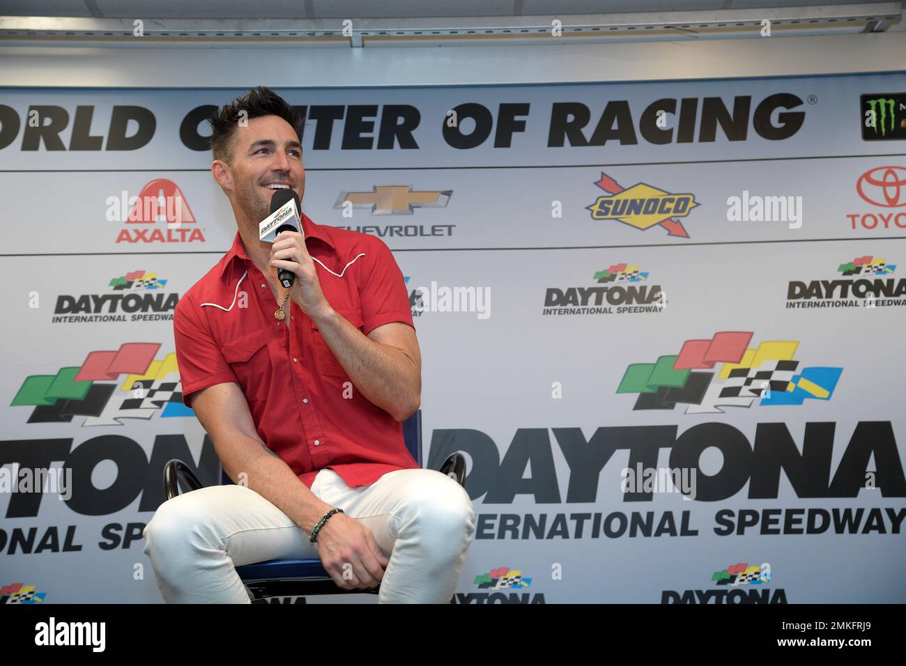 Entertainer Jake Owen answers a question from a reporter during a news ...