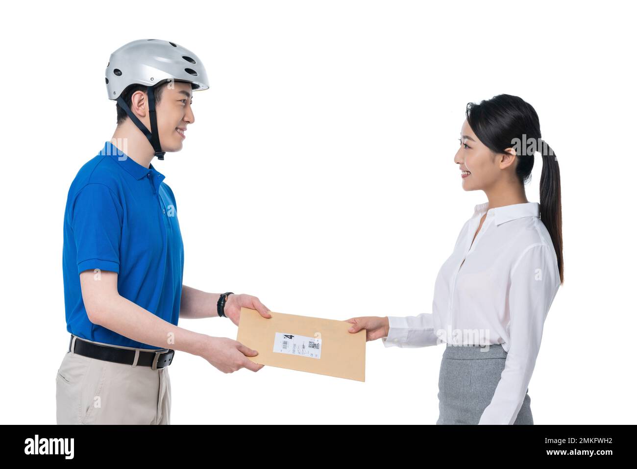 Young business lady to sign for delivery Stock Photo - Alamy