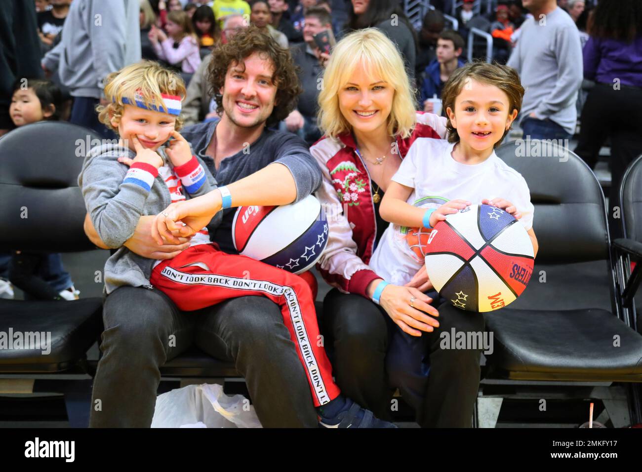 Malin Åkerman and her family attend The Harlem Globetrotters game at ...