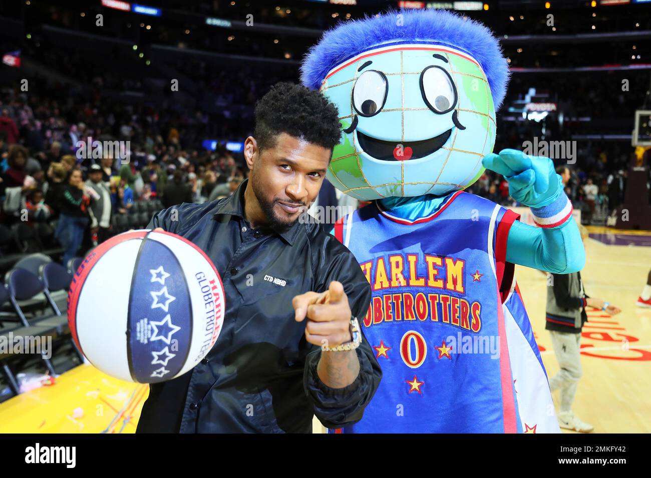 Usher attends The Harlem Globetrotters game at Staples Center on Feb ...