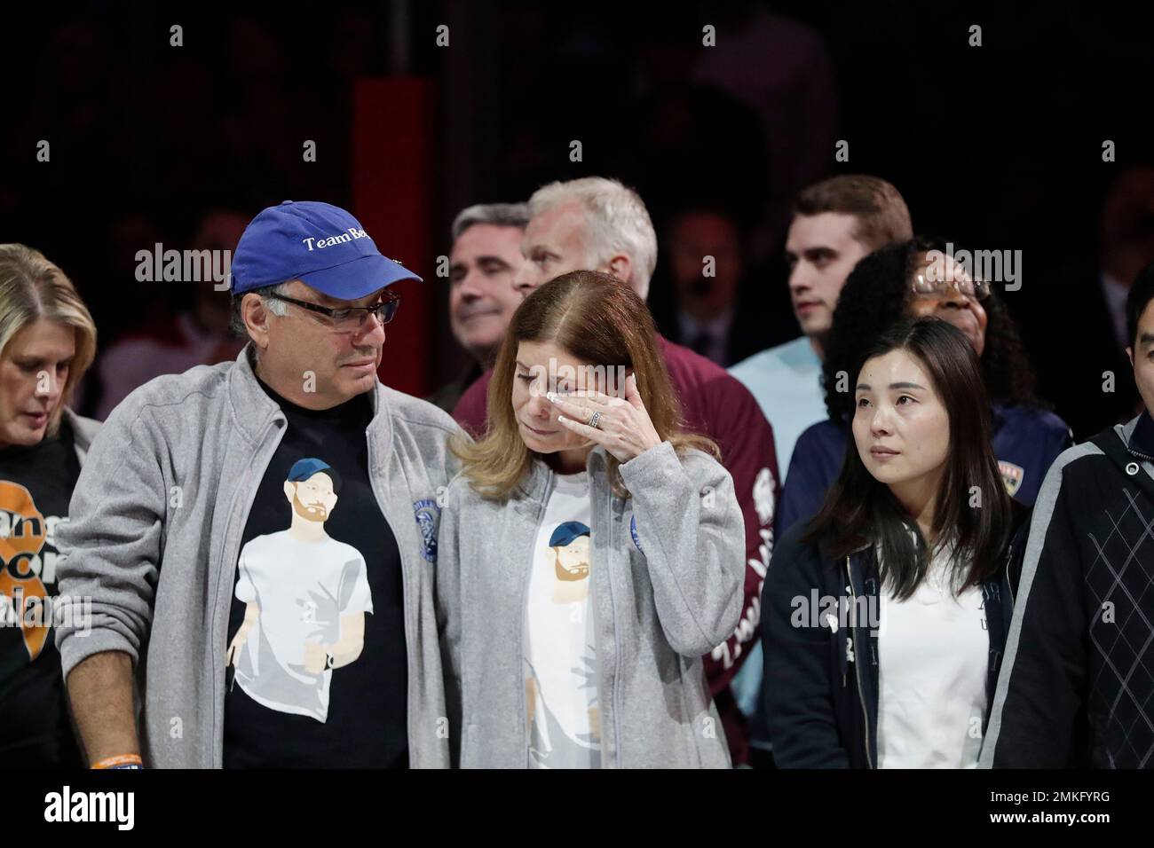 Linda Beigel Schulman, right, wipes a tear from her eye as she stands ...