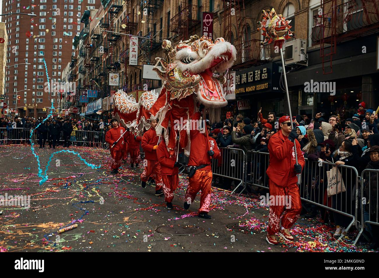 Members of a dragon dance group carry the dragon during the Chinese ...