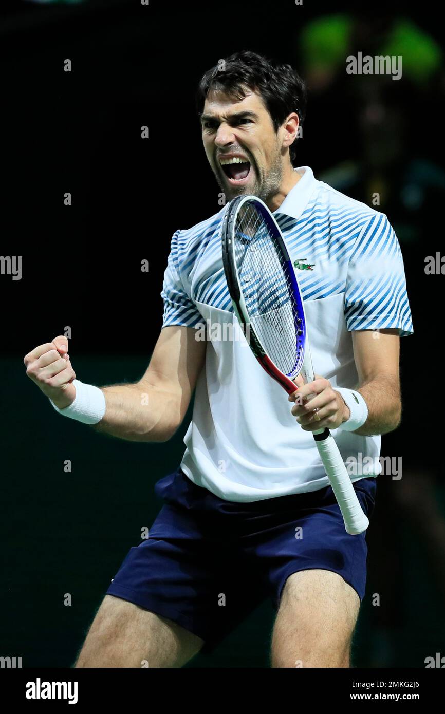 Jeremy Chardy of France celebrates winning the men's doubles final with ...
