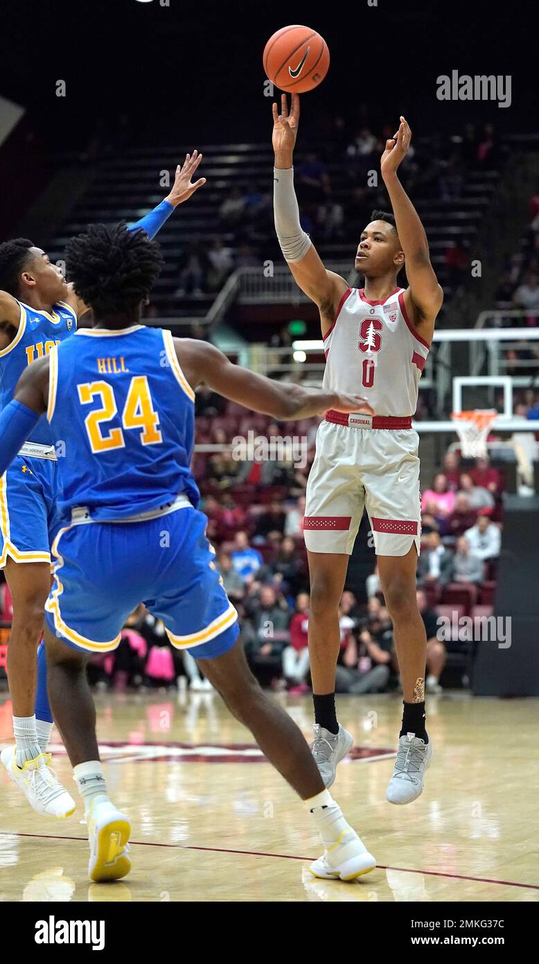 UCLA Stanford forward KZ Okpala (0) takes a 3-point shot UCLA's Jaylen ...