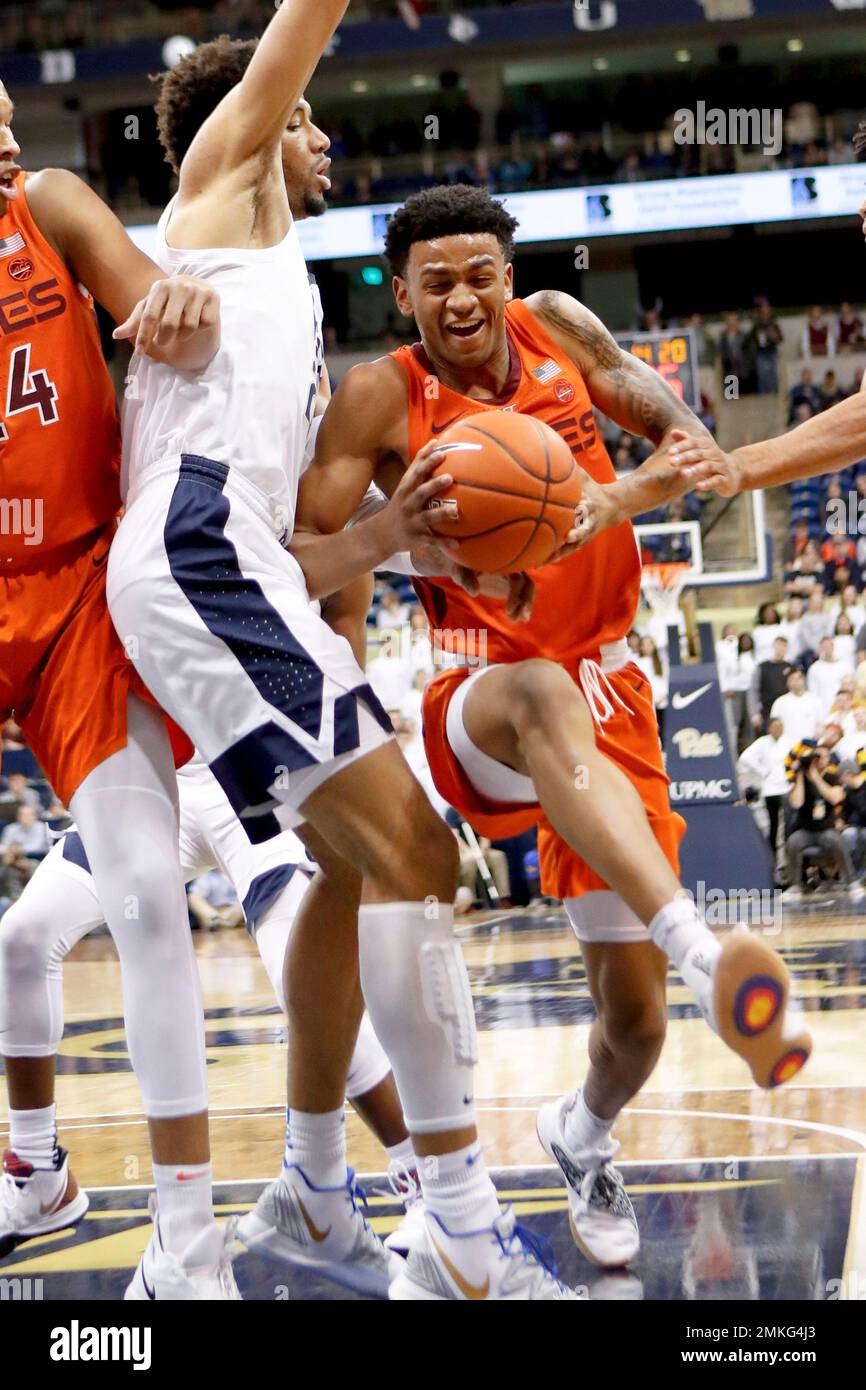 Virginia Tech's Nickeil Alexander-Walker, right, tries to get around ...