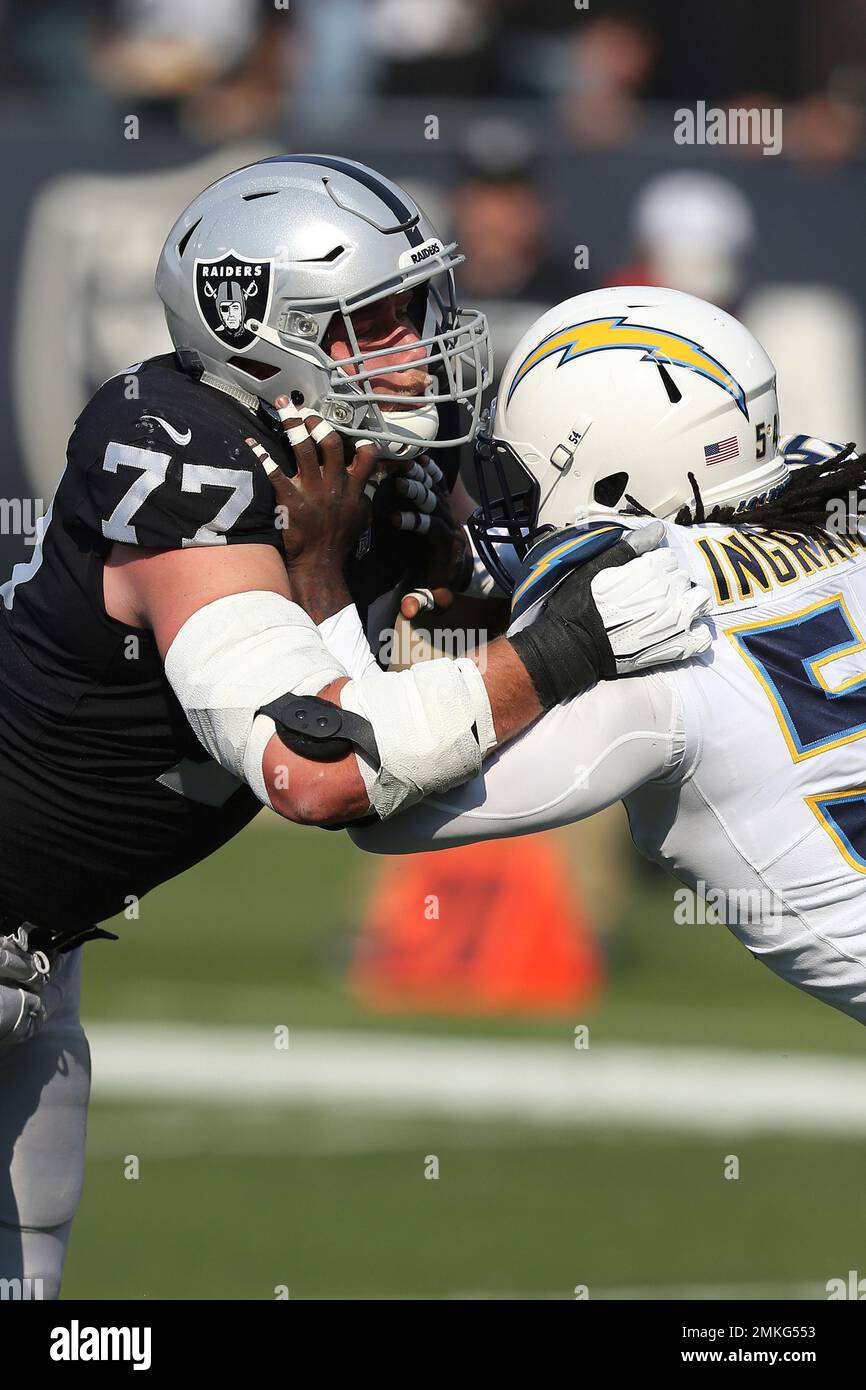 Oakland Raiders tackle Kolton Miller (77) blocks Melvin Ingram against ...