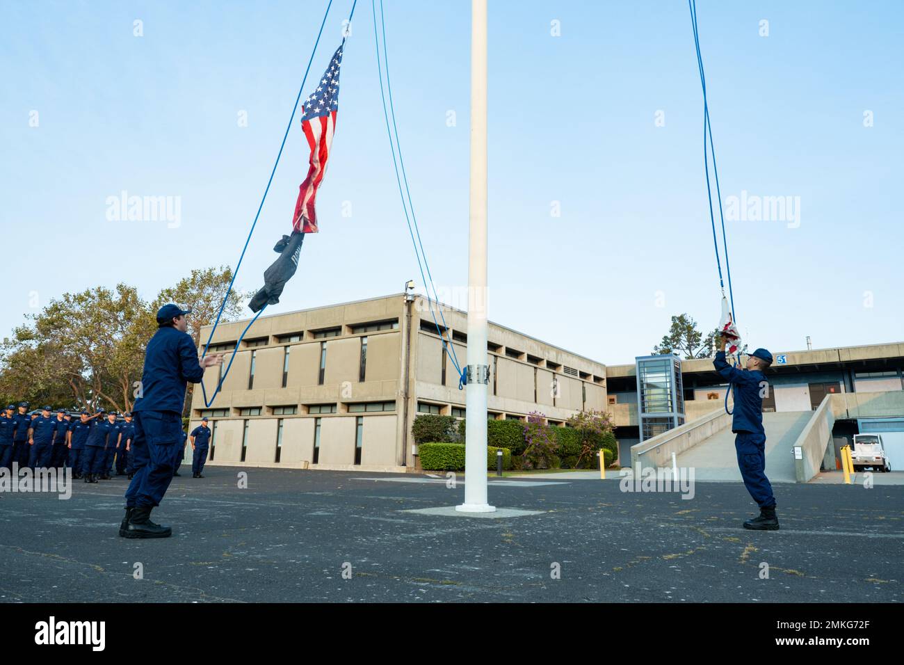 U.S. Coast Guard members participate in a 9/11 observance ceremony on ...