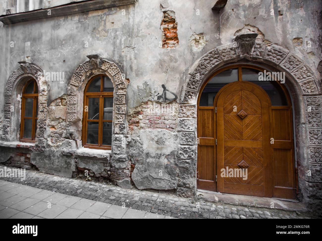 ancient facade of the house, old doors and windows Stock Photo - Alamy
