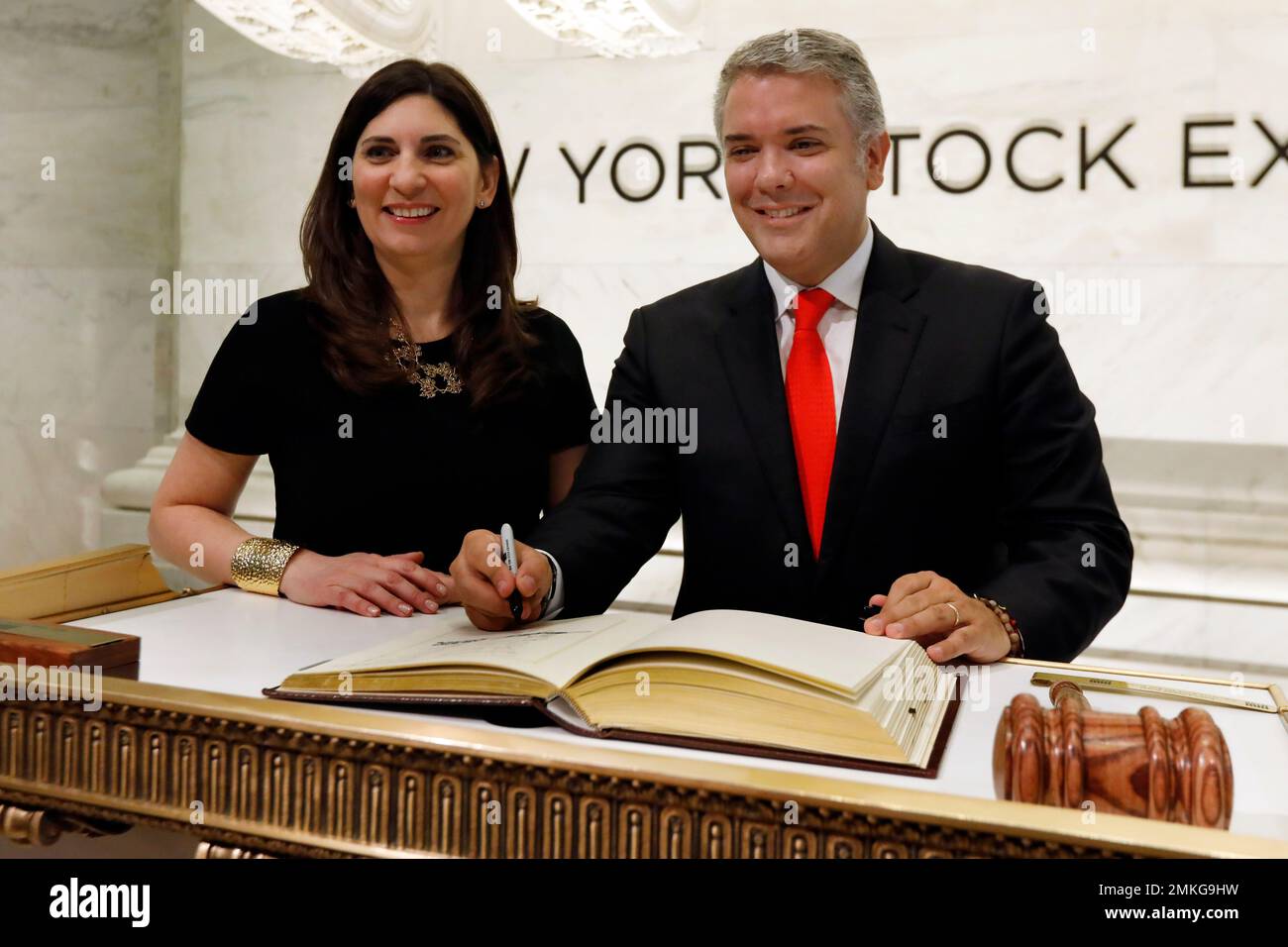 Colombia's President Ivan Duque Marquez and NYSE President Stacey ...