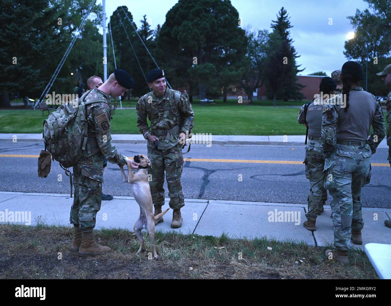Members from the 90th Security Forces Group prepare to do a 5 kilometer ...