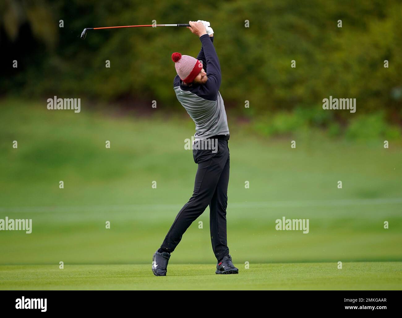 Patrick Rodgers hits his second shot on the 17th hole as first round ...