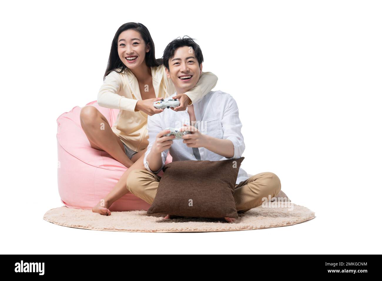 Young couple together playing computer games Stock Photo - Alamy