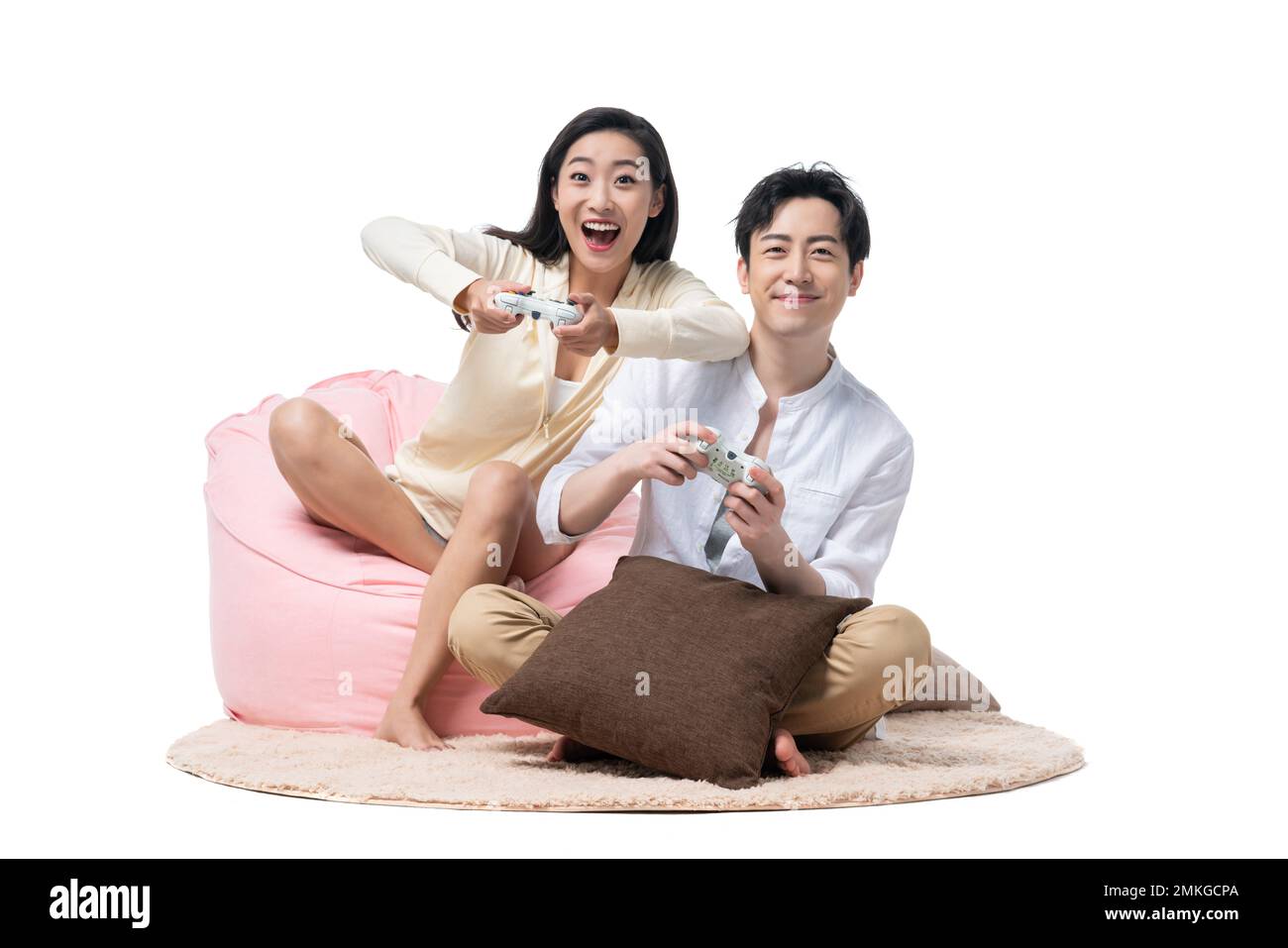 Young couple together playing computer games Stock Photo - Alamy