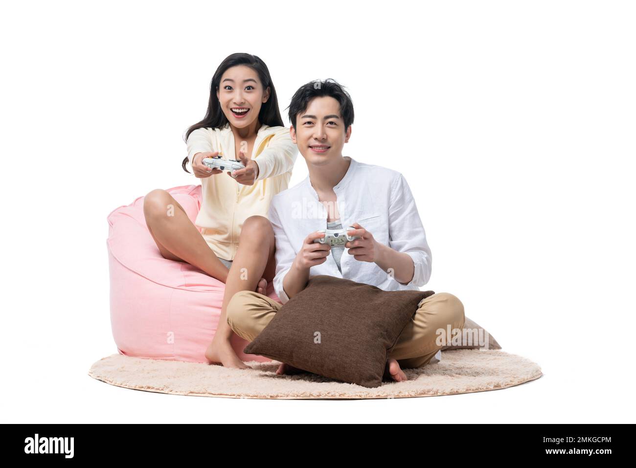 Young couple together playing computer games Stock Photo - Alamy