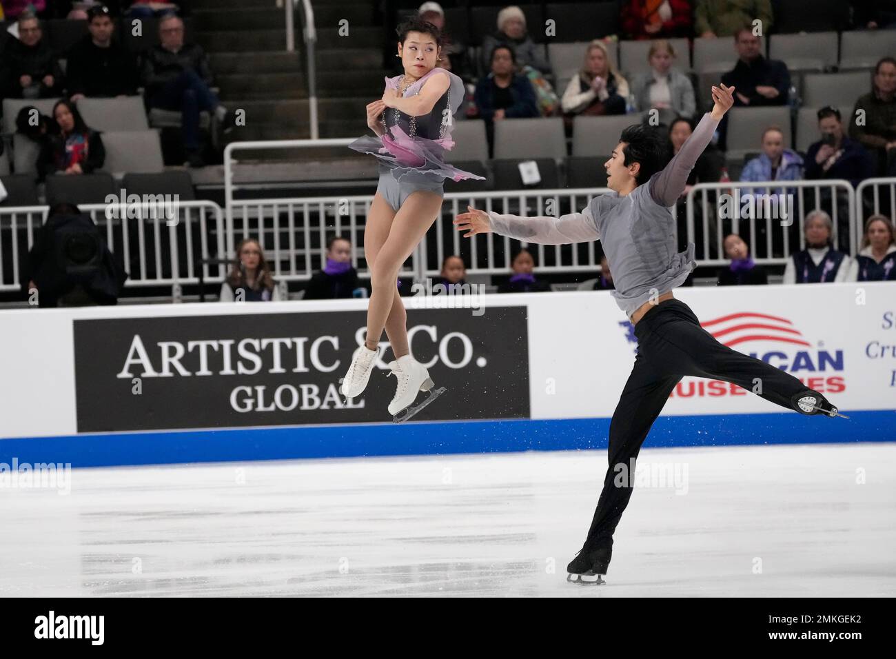 Emily Chan, left, and Spencer Howe perform during the pairs free skate ...