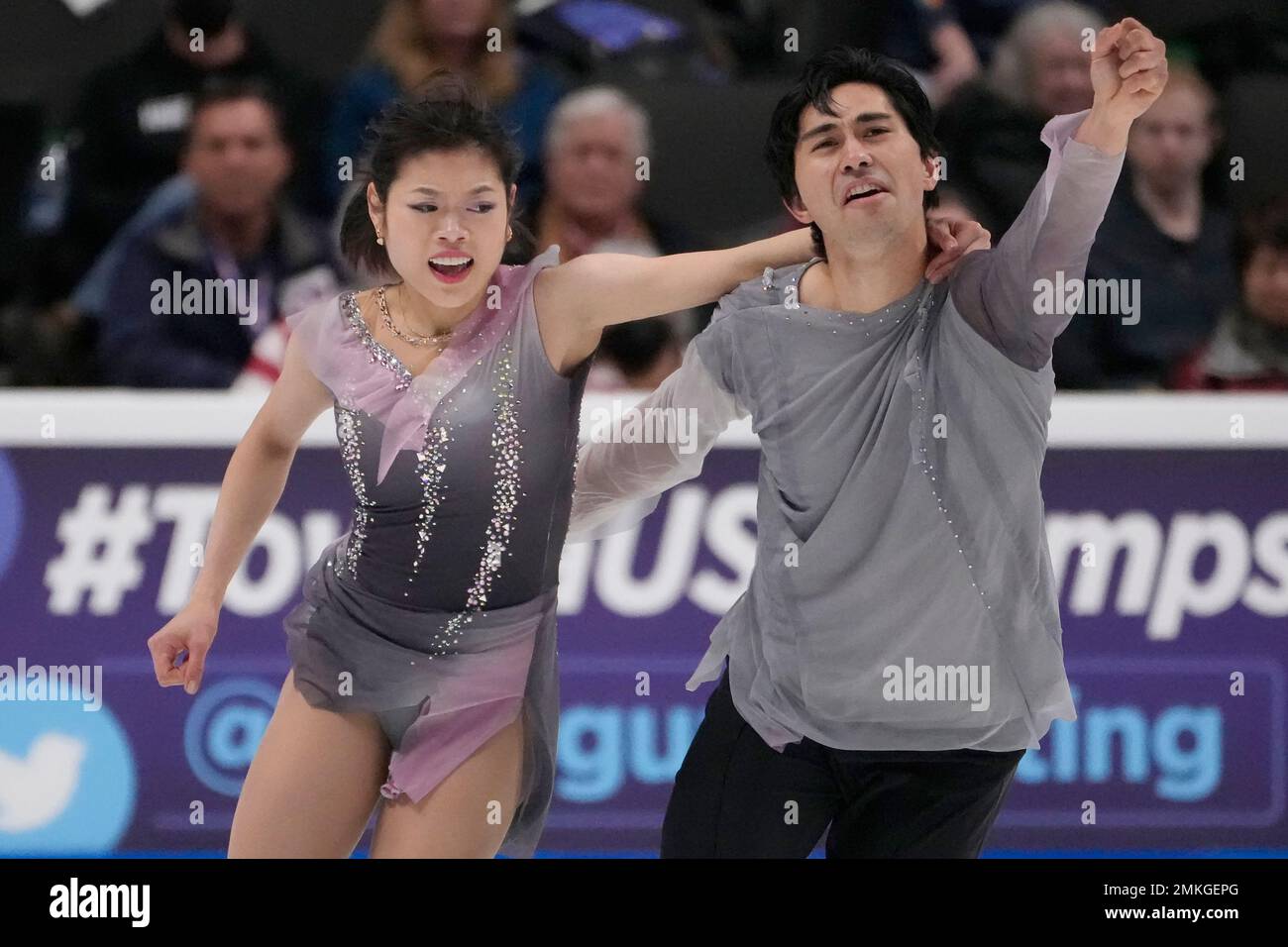 Emily Chan, left, and Spencer Howe react after performing during the ...