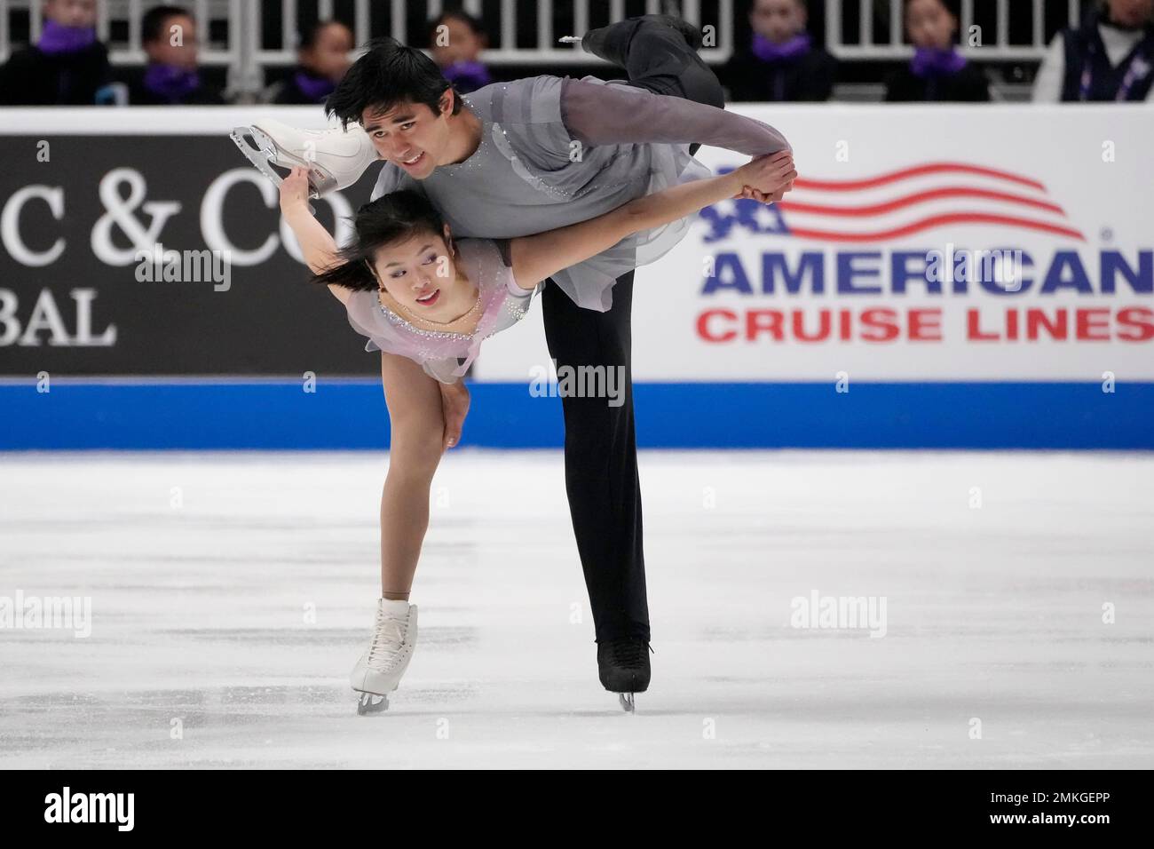 Emily Chan, left, and Spencer Howe perform during the pairs free skate ...