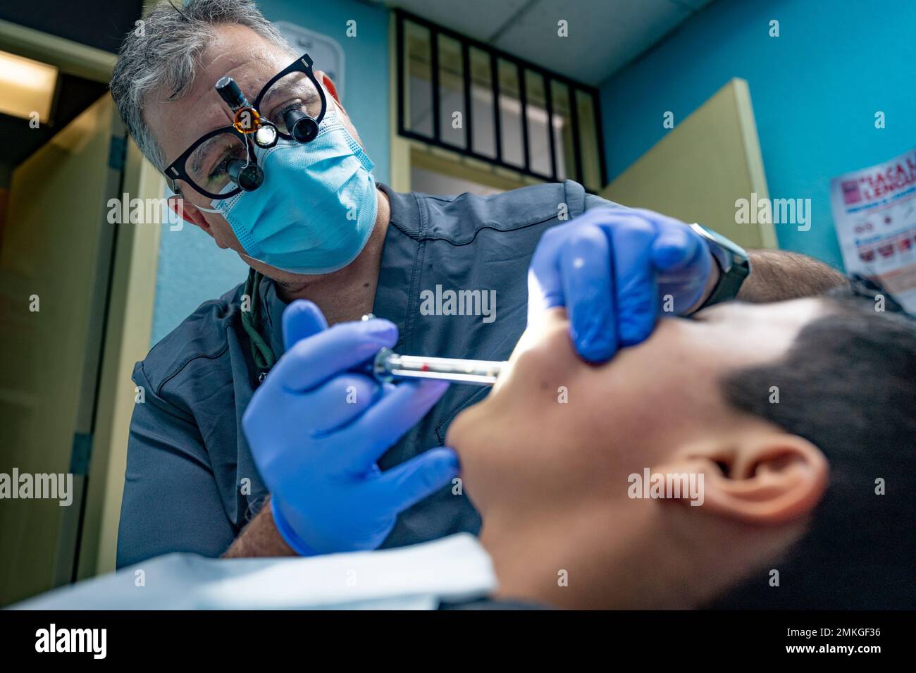 U.S. Army Lt. Col. Rex Monif, a dentist assigned to 806th Hospital ...