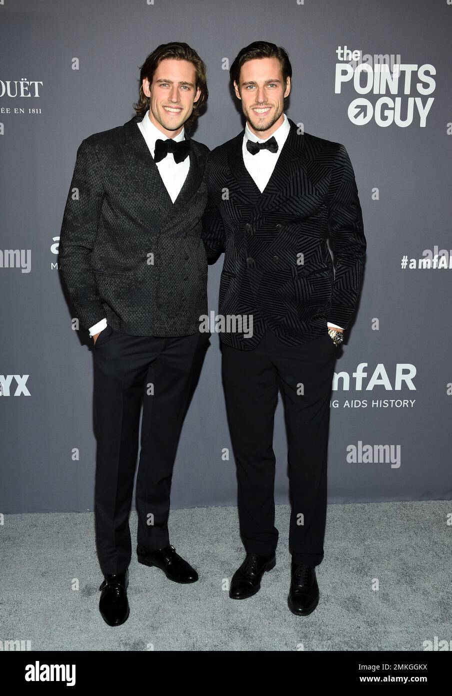 Twin models Zac Stenmark, left, and Jordan Stenmark attend the amfAR ...