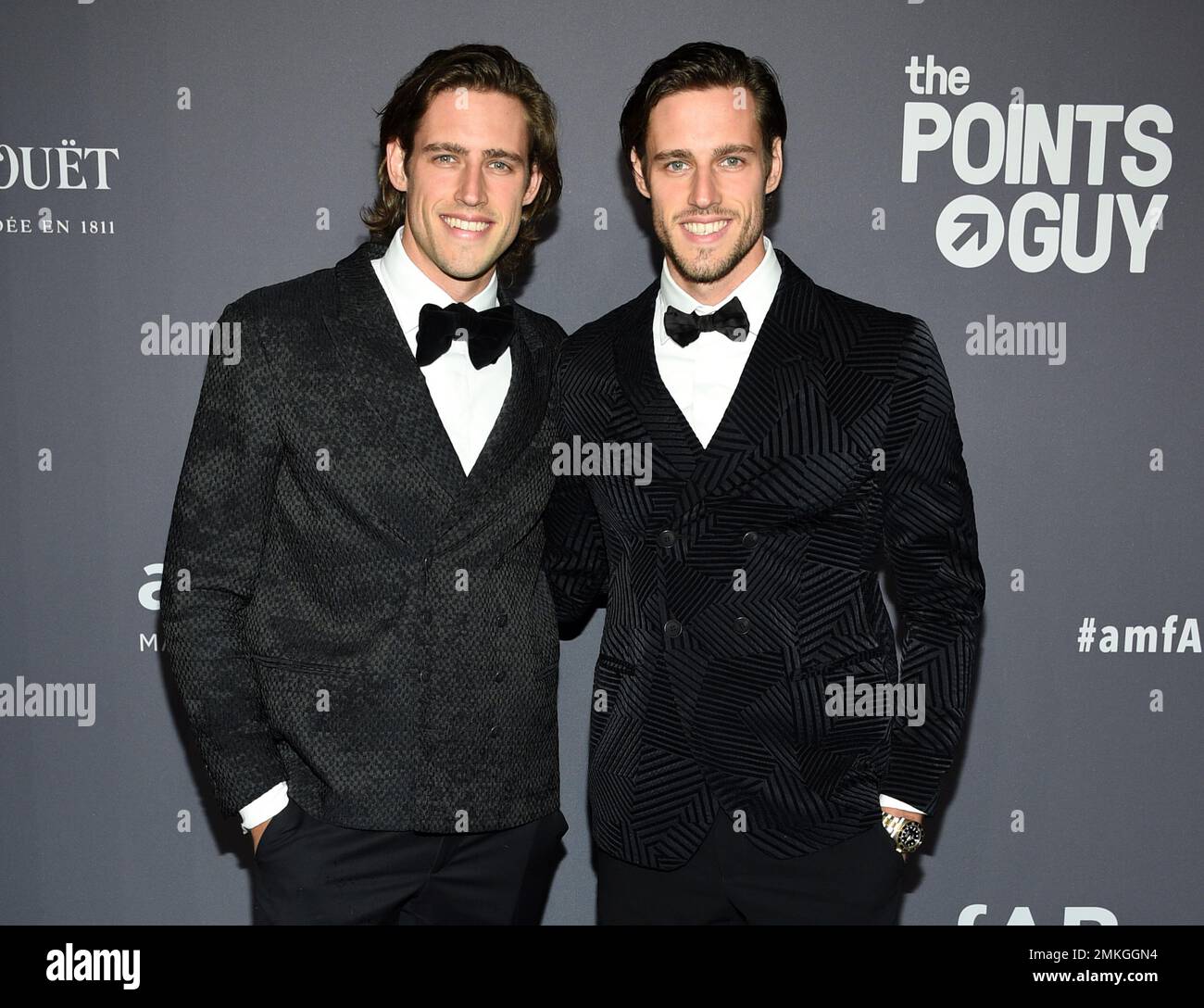 Twin models Zac Stenmark, left, and Jordan Stenmark attend the amfAR ...