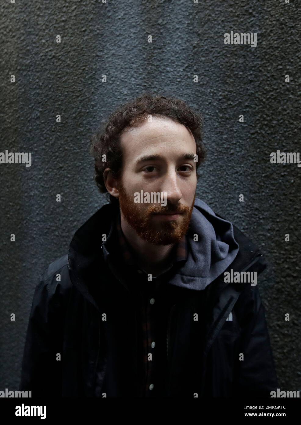 Teacher Will Corvin poses for a photo at his home in Oakland, Calif ...