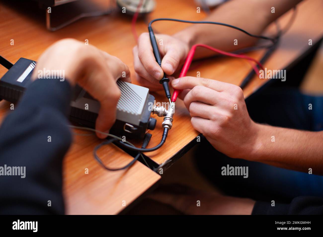 engineers work with electrical measuring devices Stock Photo - Alamy