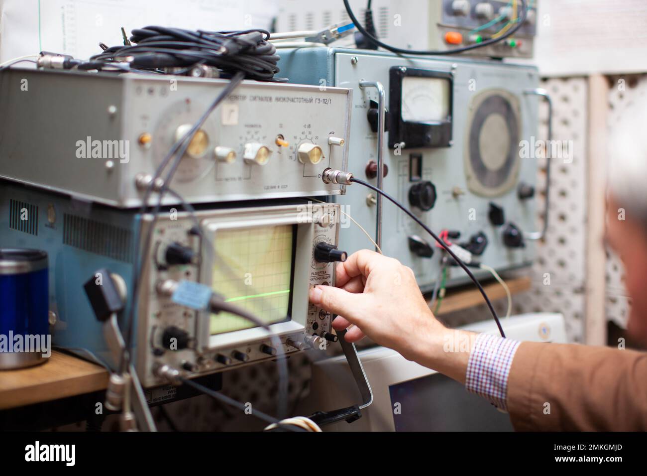 engineers work with electrical measuring devices Stock Photo - Alamy