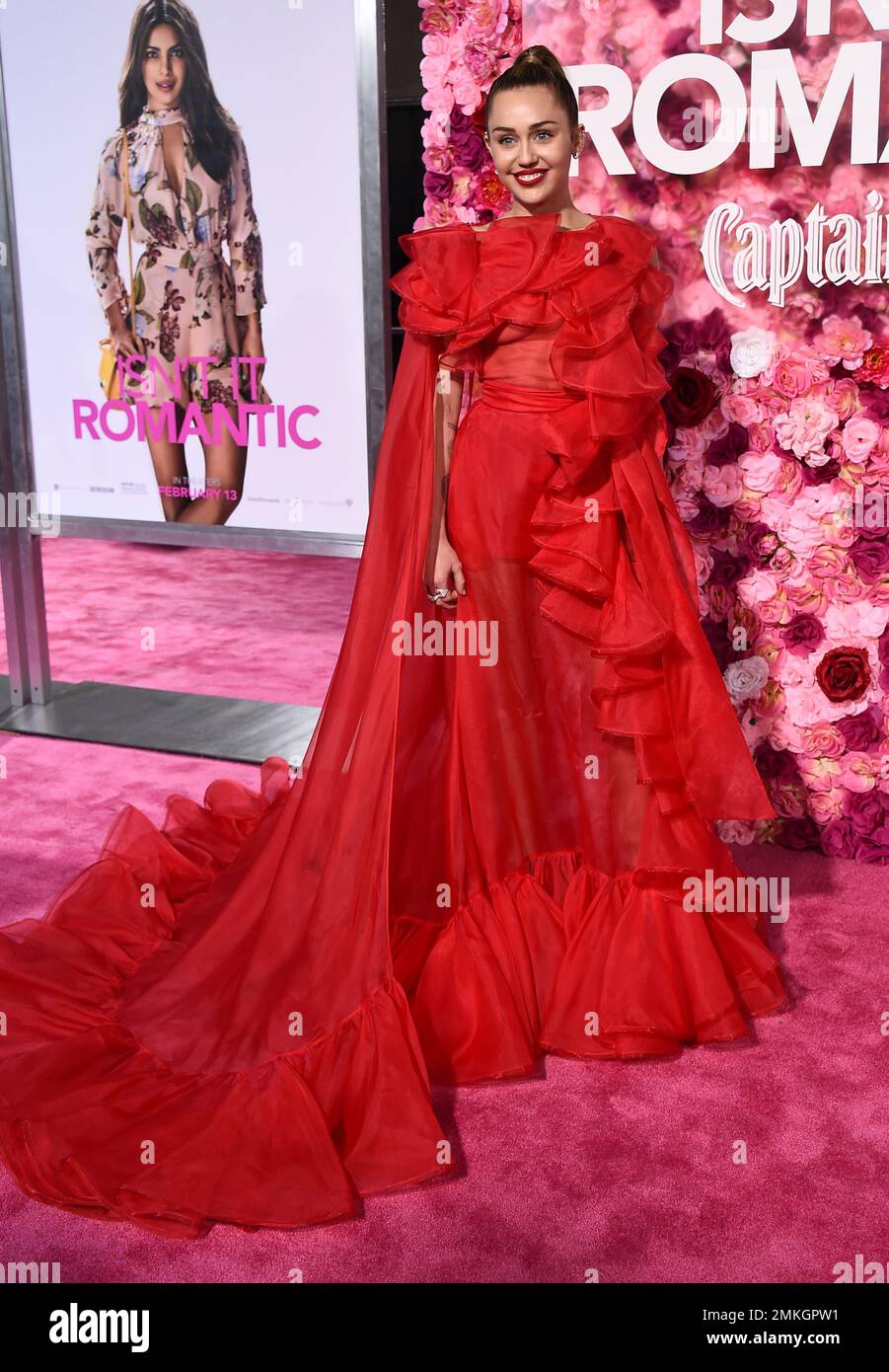 Miley Cyrus arrives at the Los Angeles premiere of "Isn't It Romantic ...