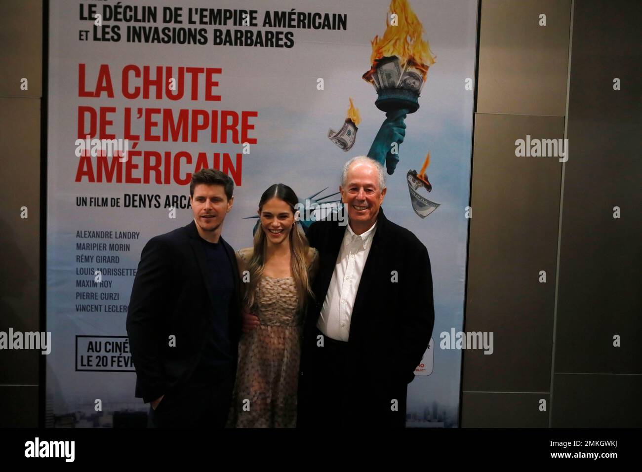 Canadian director Denys Arcand, right, actor Alexandre Landry, left ...