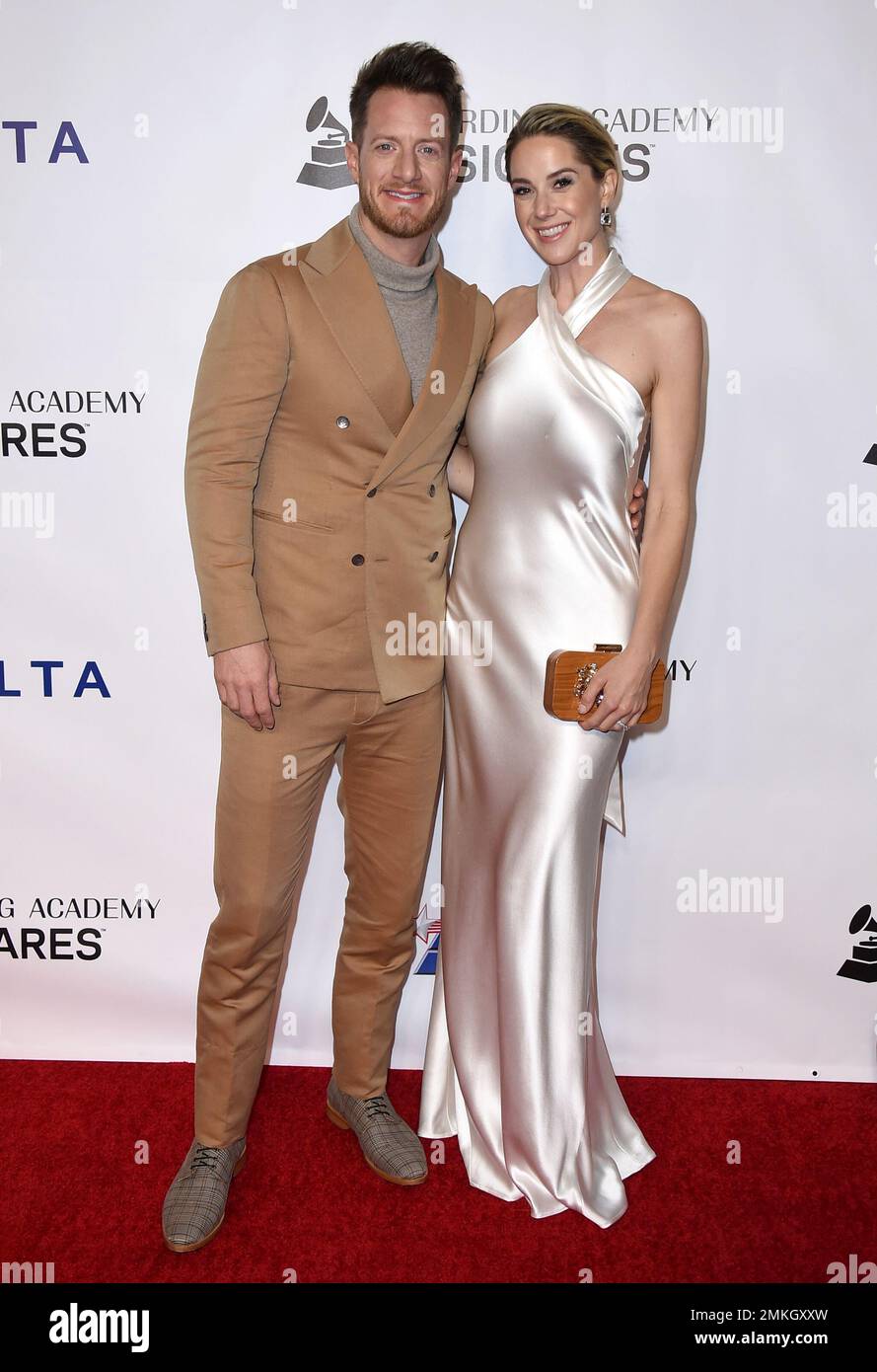 Tyler Hubbard, left, and Hayley Stommel arrive at MusiCares Person of ...