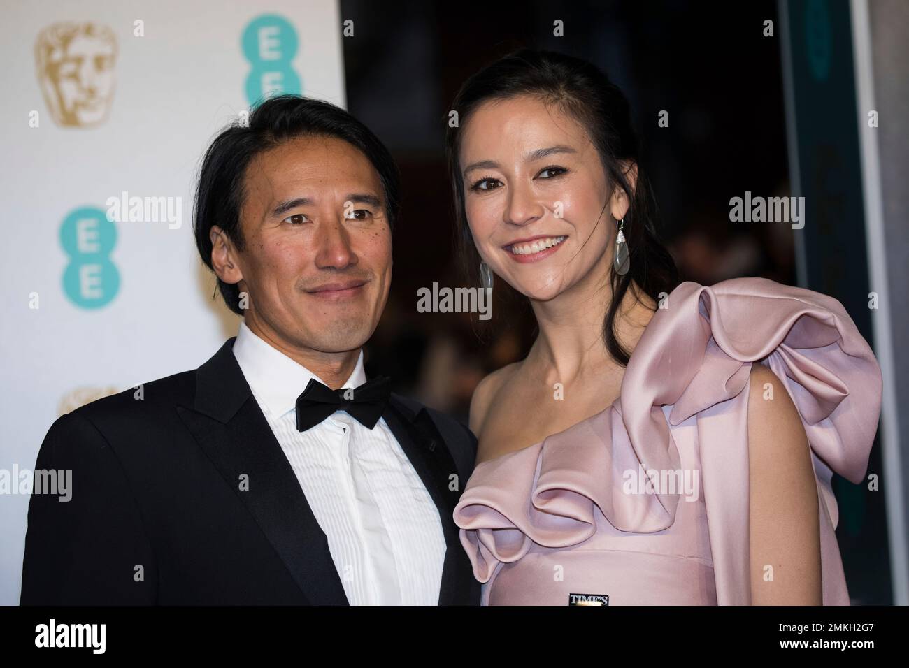Jimmy Chin and Elizabeth Chai Vasarhelyi pose for photographers upon ...