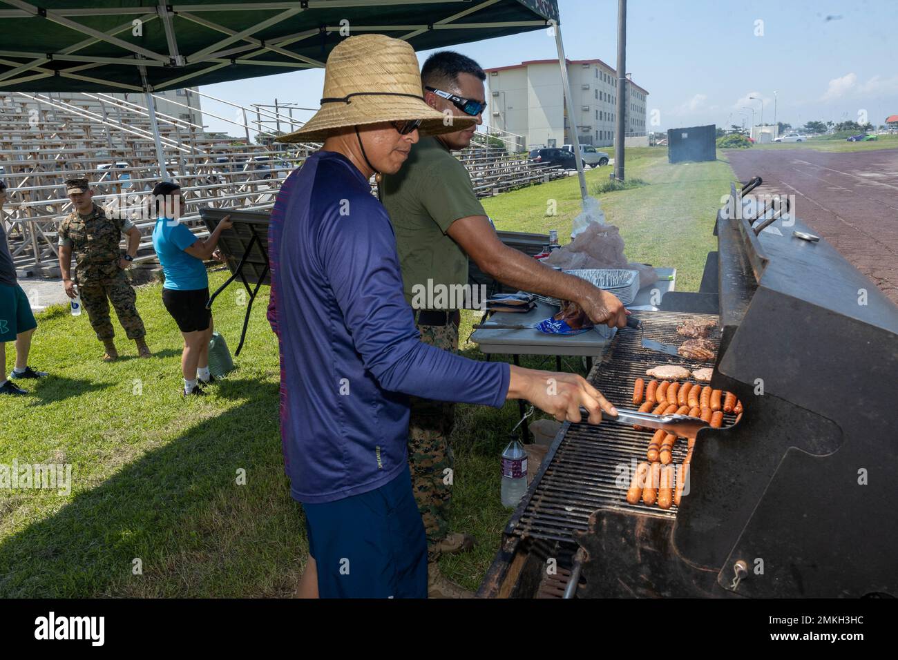 U.S. Marine Corps Master Sgt. Rigoberto Ramirez, left, the Rations ...