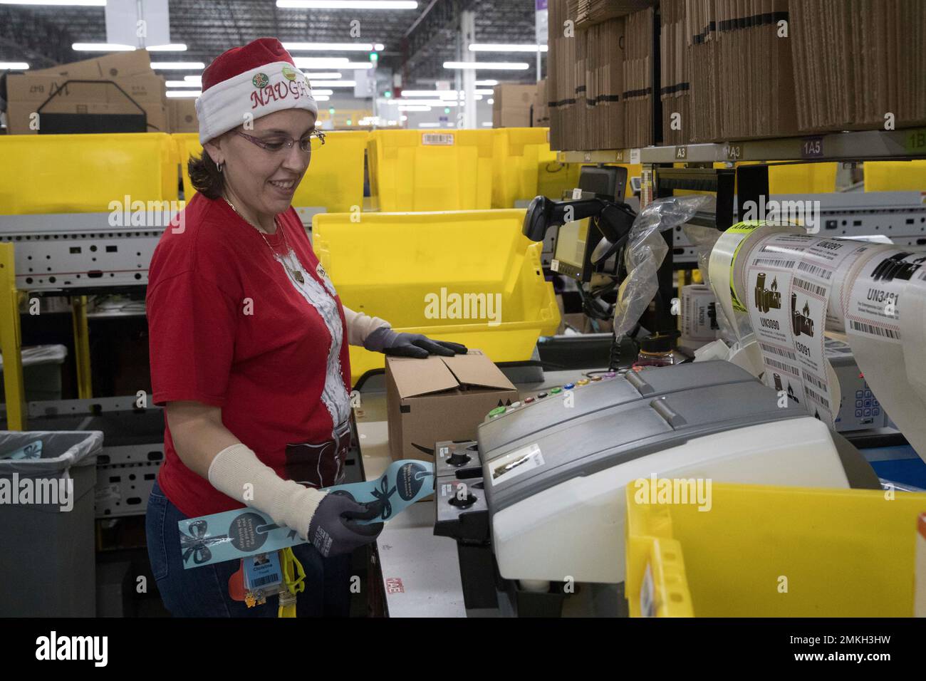In this Wednesday, Dec. 5, 2018, photo Amazon Packer Christina Trivelli ...