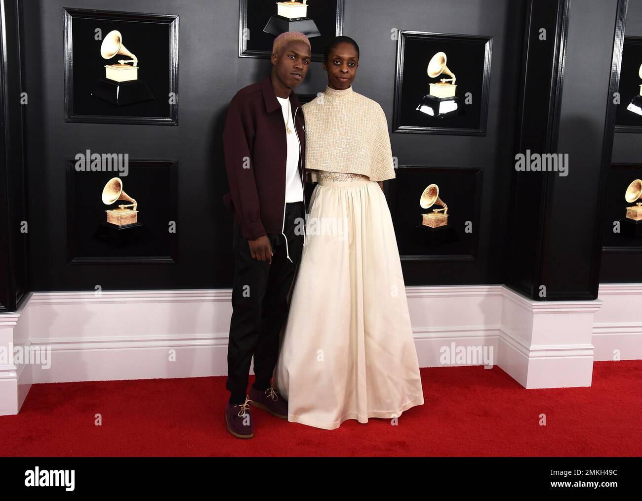 Daniel Caesar, left, and guest arrive at the 61st annual Grammy Awards ...