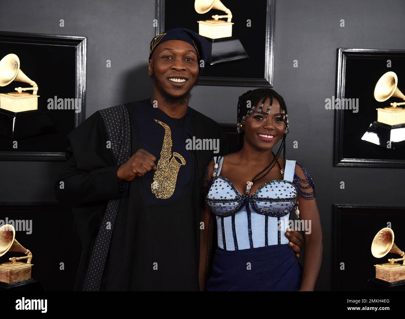 Seun Kuti, left, and Yetunde George Ademiluyi arrive at the 61st annual ...