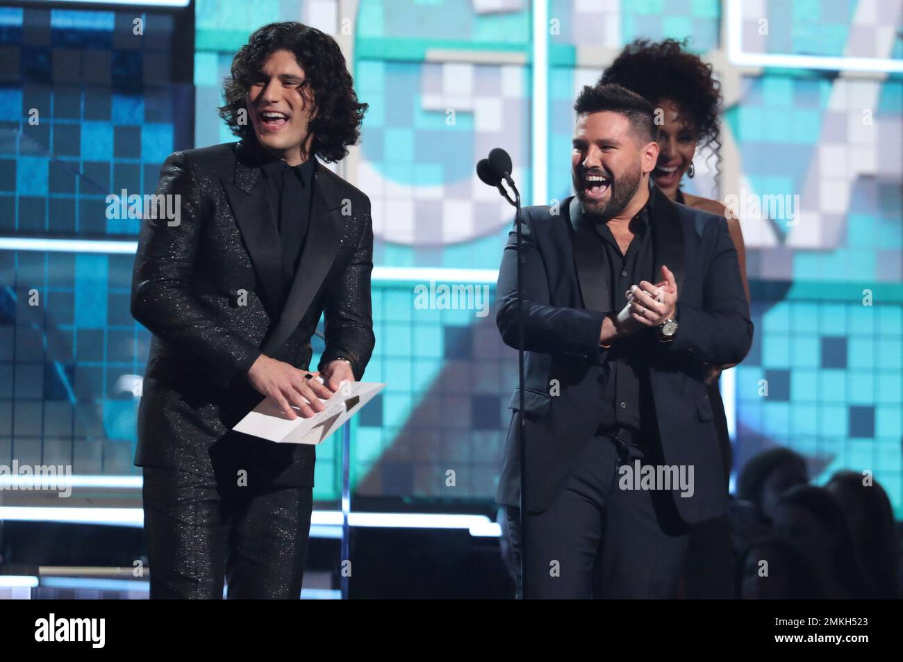Dan Smyers, left, and Shay Mooney, of Dan + Shay, present the award for ...