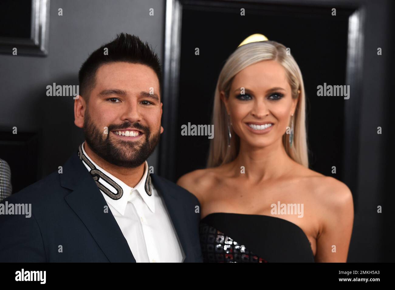 Shay Mooney of Dan + Shay, left, and Hannah Mooney arrive at the 61st ...