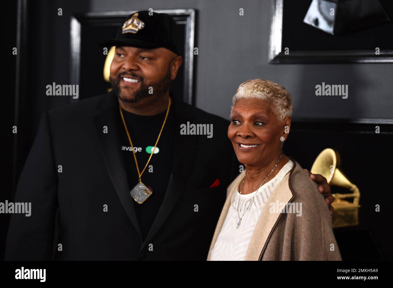 Damon Elliott, left, and Dionne Warwick arrive at the 61st annual ...