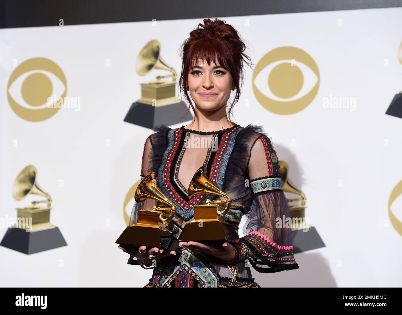 Laura Daigle poses in the press room with the awards for best ...