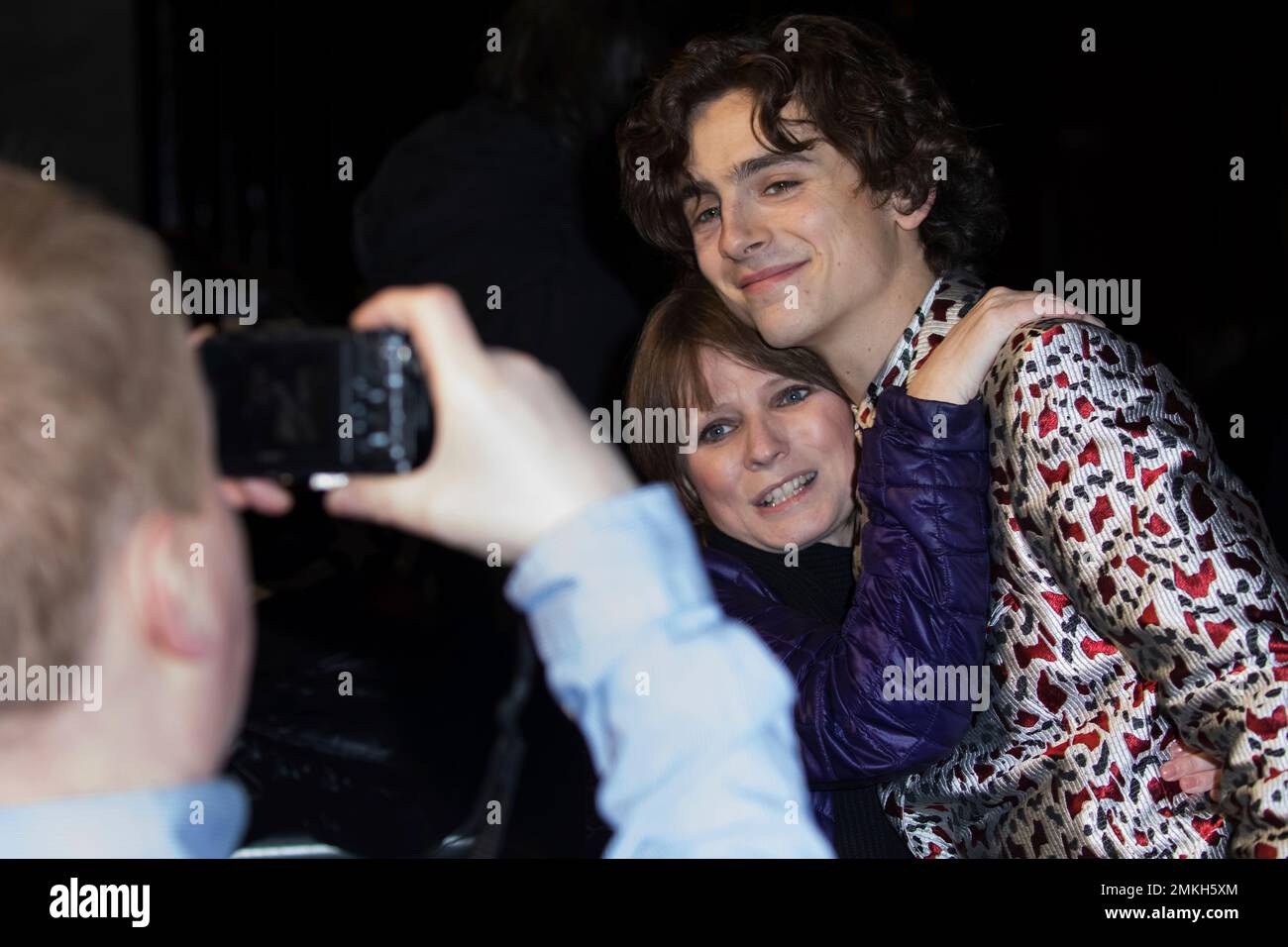 Actor Timothee Chalamet poses for photographs with fans upon arrival at ...